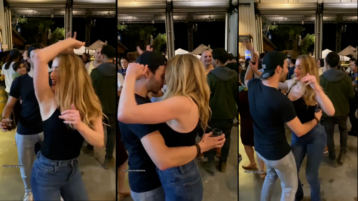 Amber Heard shares an intimate dance with film crew member who worked ...