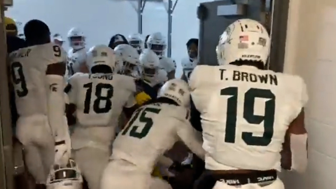 Michigan State suspends four players for 'unacceptable' tunnel fight ...