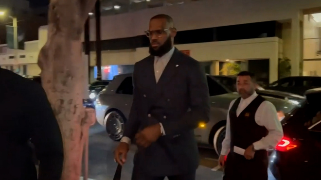 LeBron James shocks young girl after he sits next to her courtside at ...