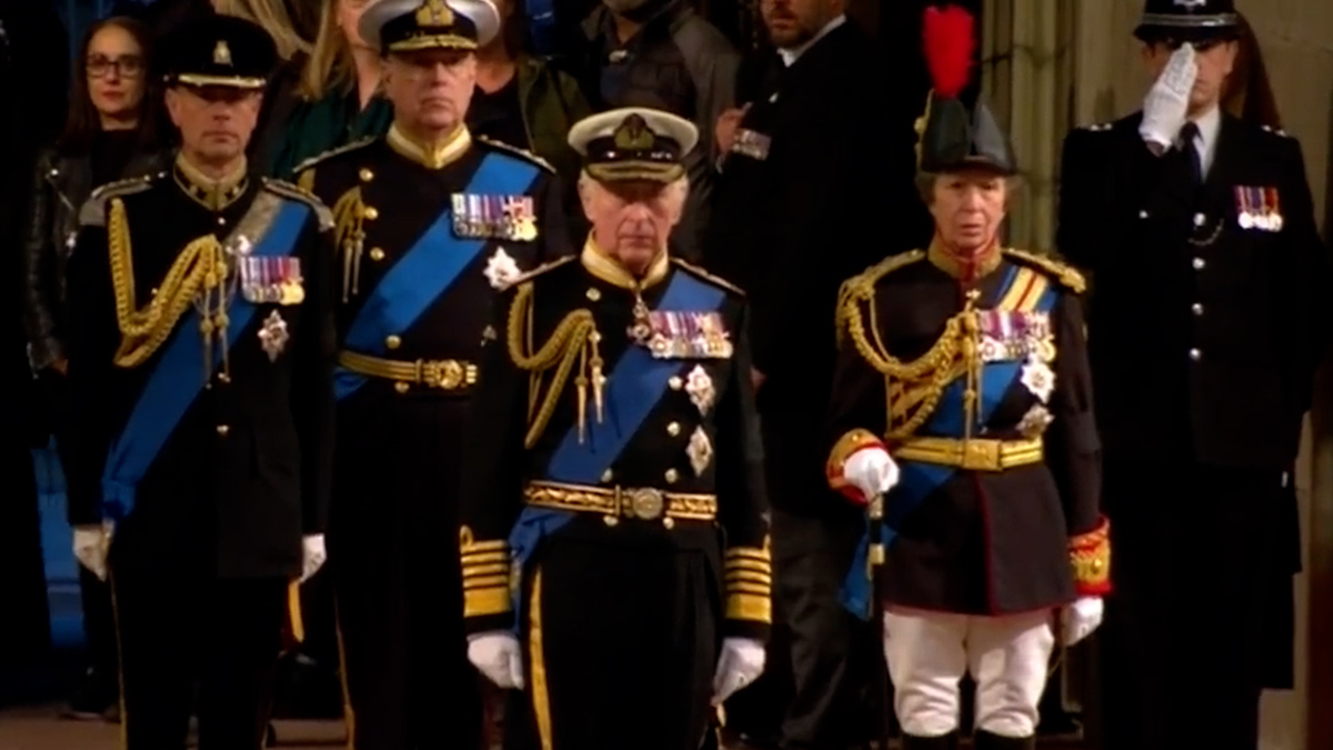 King Charles III guards his mother's coffin in Westminster Hall